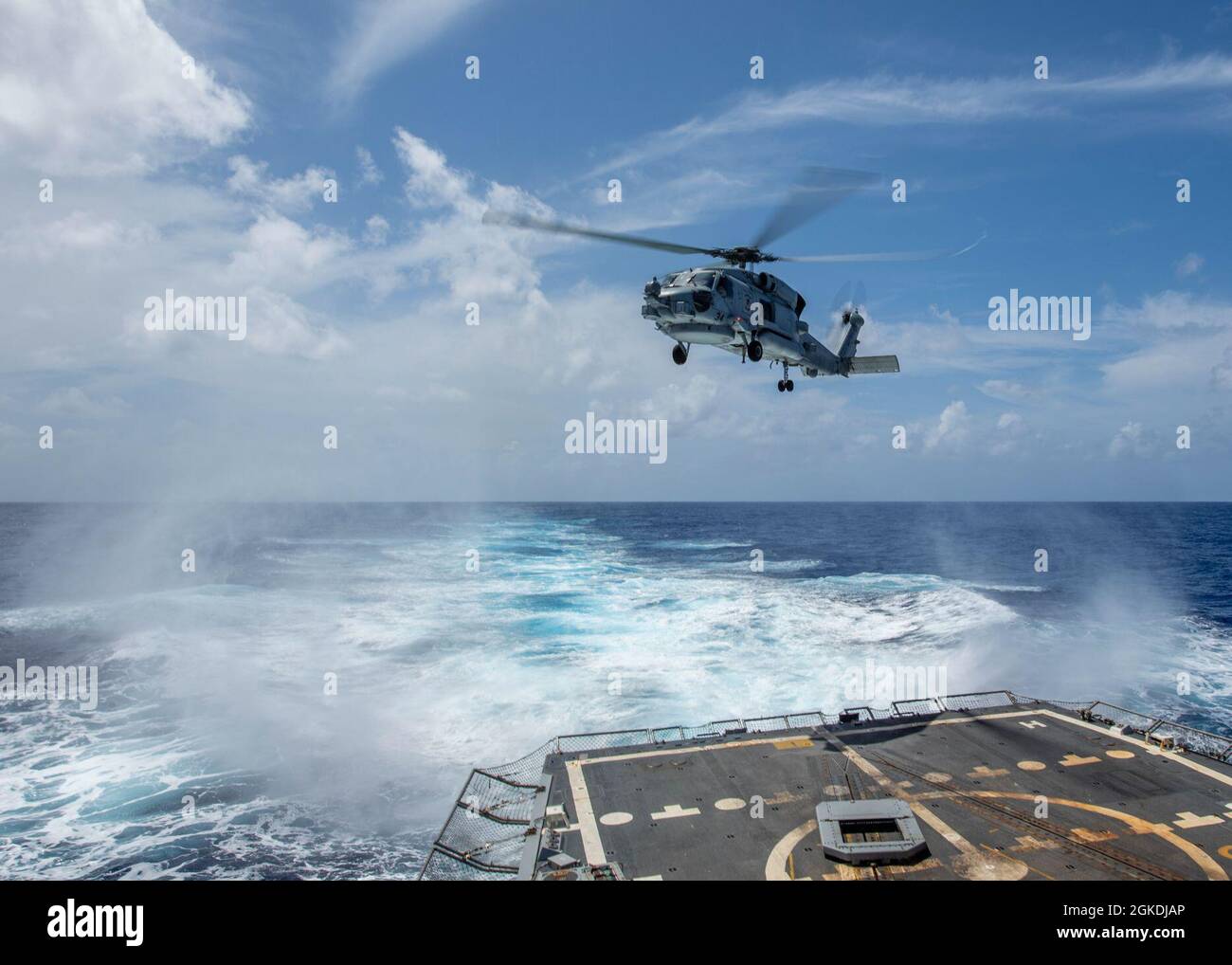 PACIFIC OCEAN (March 22, 2021) An MH-60R Sea Hawk, assigned to the ...