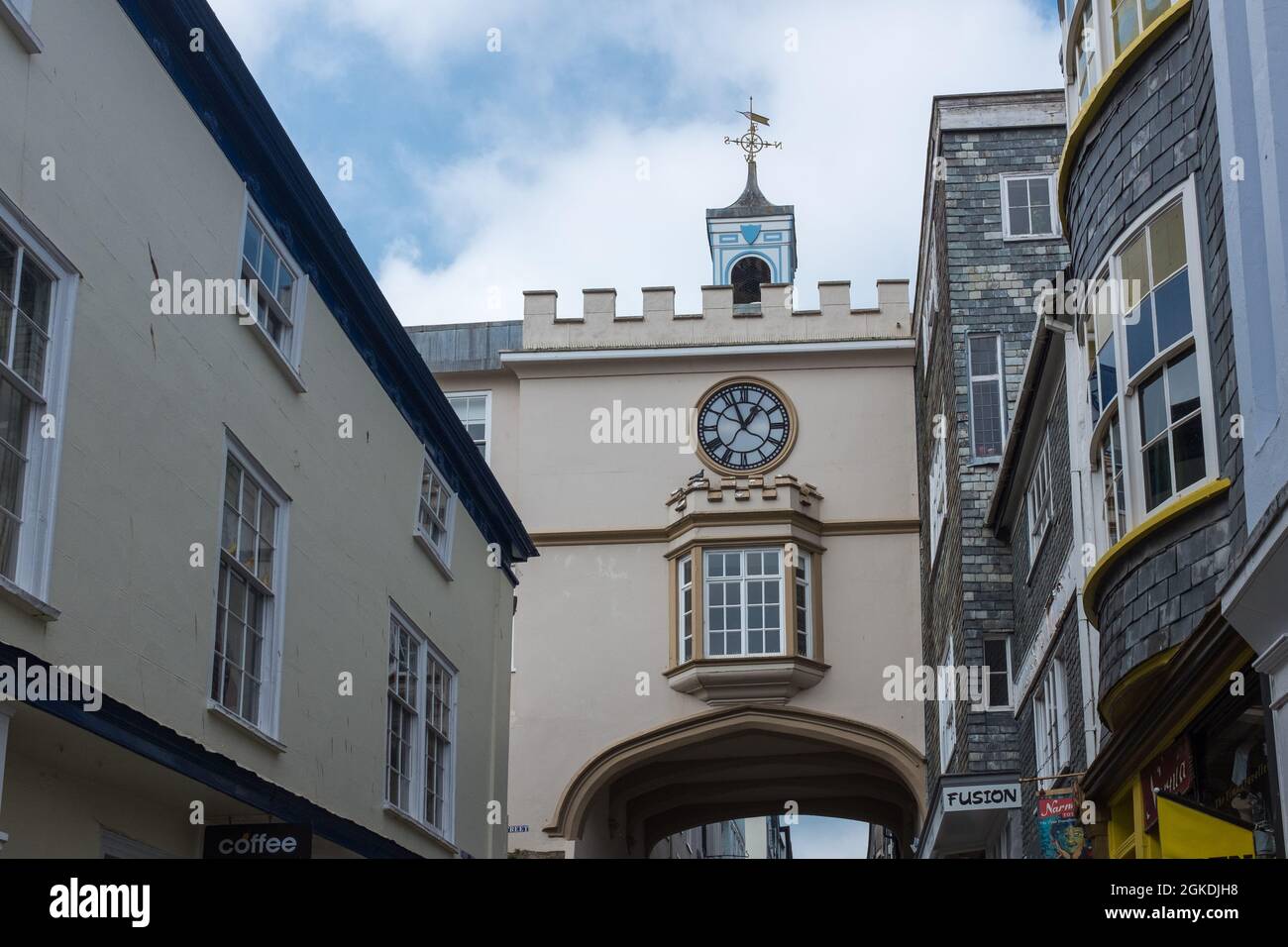 East Gate Tudor arch and clock tower over Totnes High Street, Devon was ...