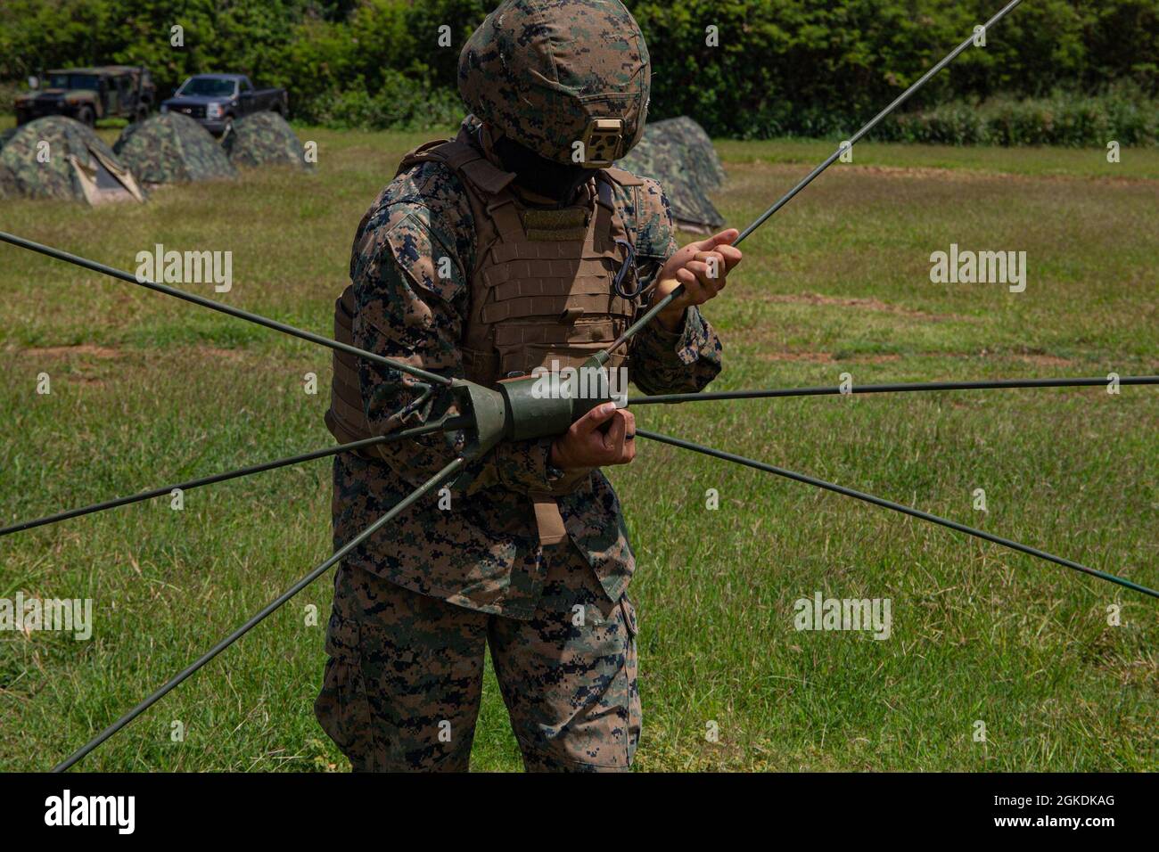 A U.S. Marine with communications platoon, Combat Logistics Battalion 3 ...