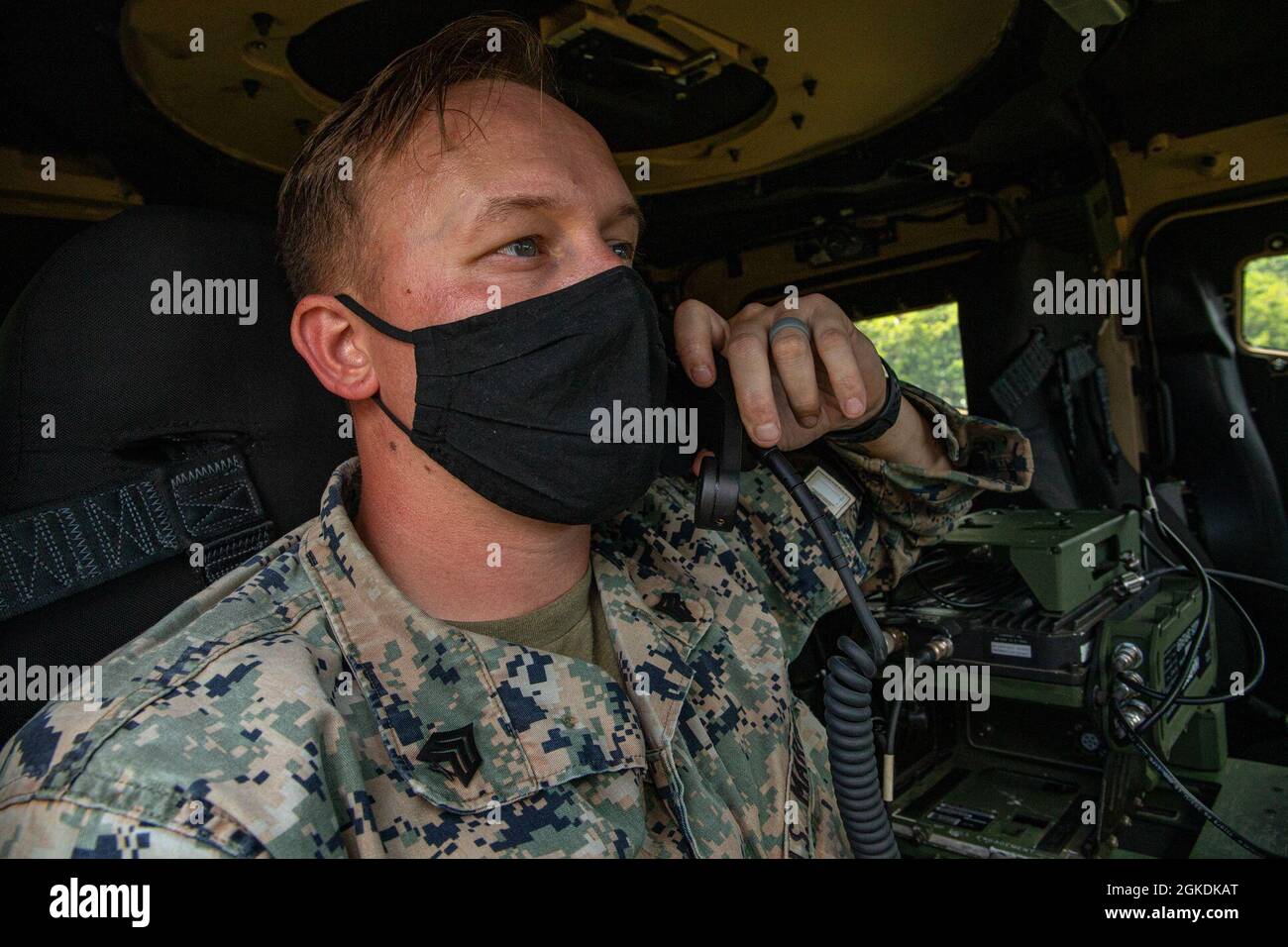 A U.S. Marine with communications platoon, Combat Logistics Battalion 3 ...