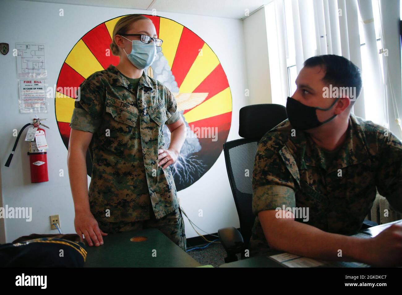 U.S. Marine Corps Cpl. Annina Tipp, and Staff Sgt. Joseph Sellers, both ...