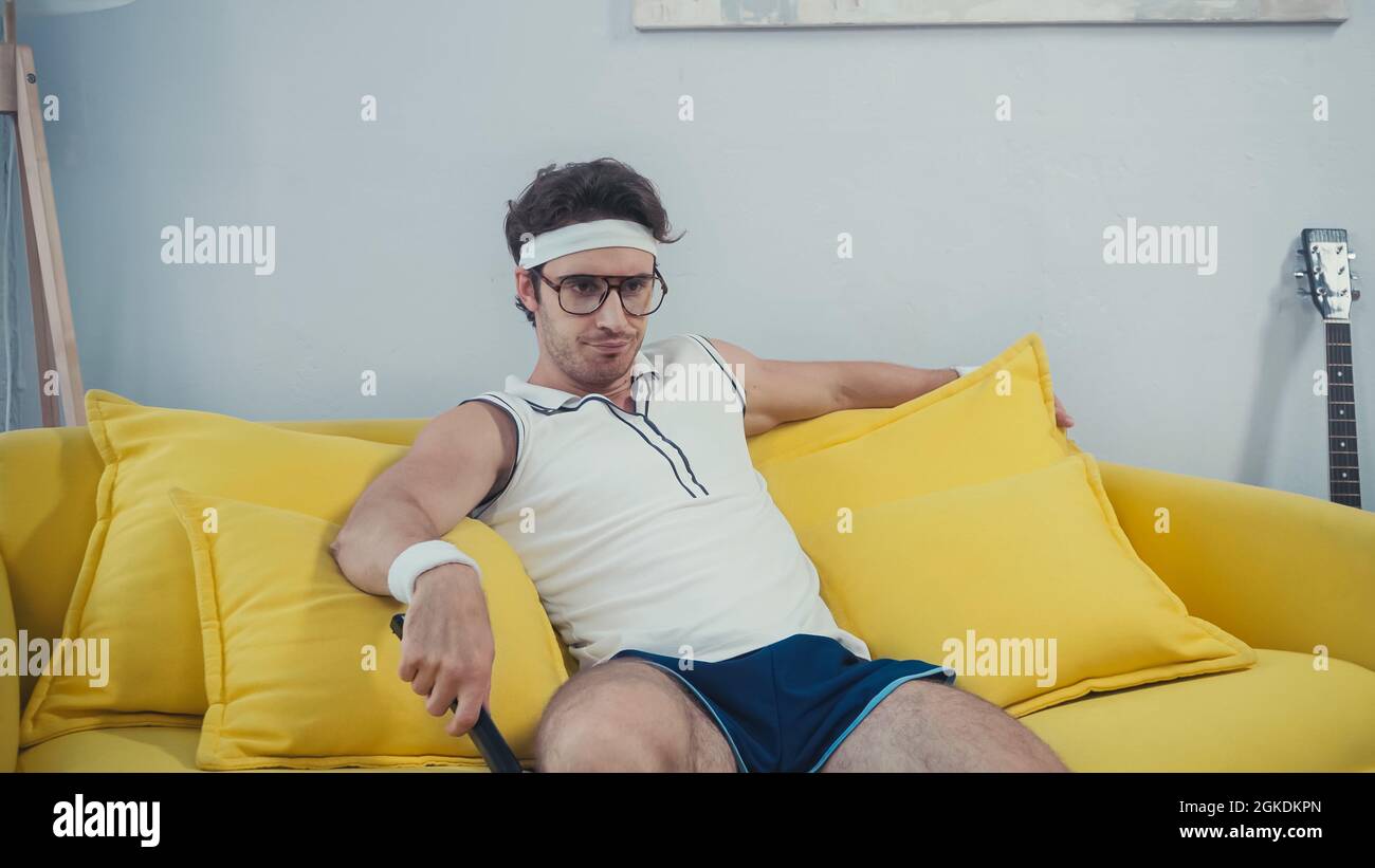 Lazy man sofa tv retro hi-res stock photography and images - Alamy