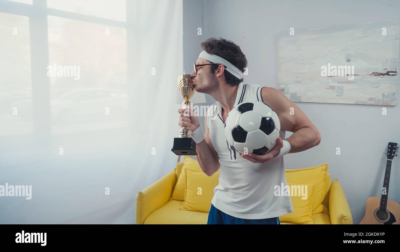 Kissing the trophy hi-res stock photography and images - Alamy