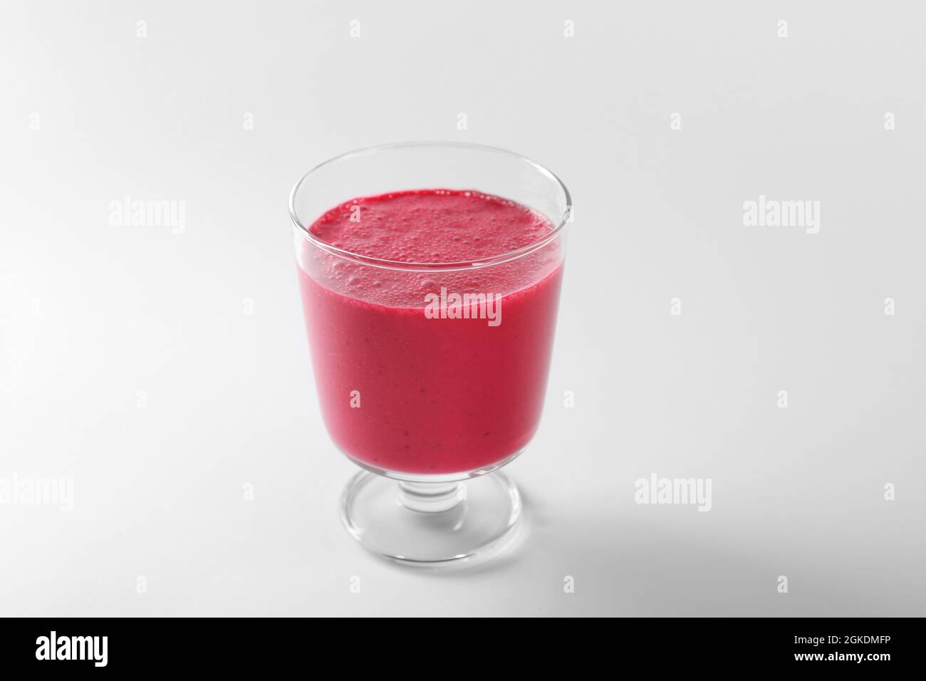 Fresh smoothie on white background Stock Photo - Alamy