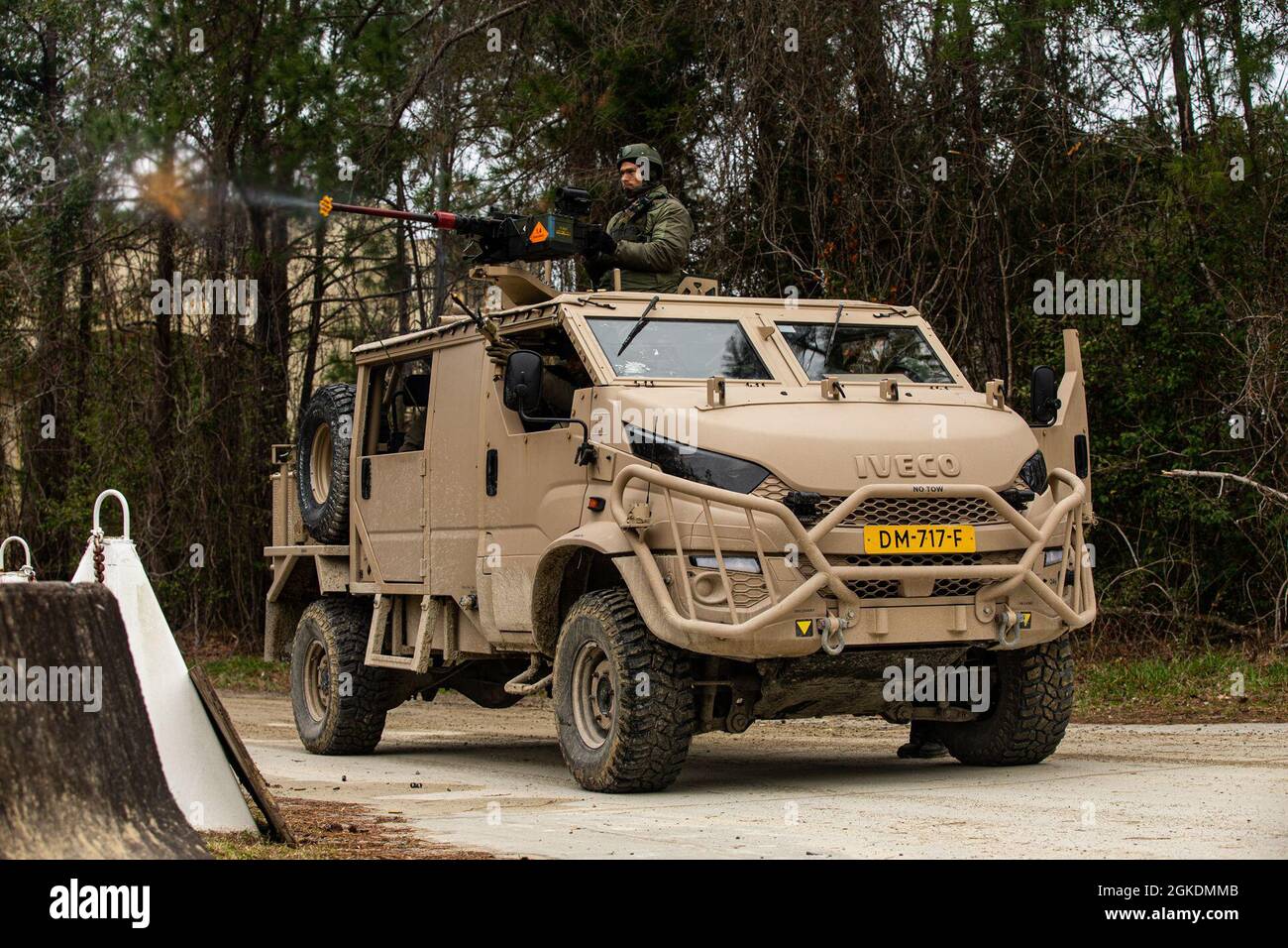 Dutch Marines with 32nd Raiding Squadron provide suppressive fire while ...