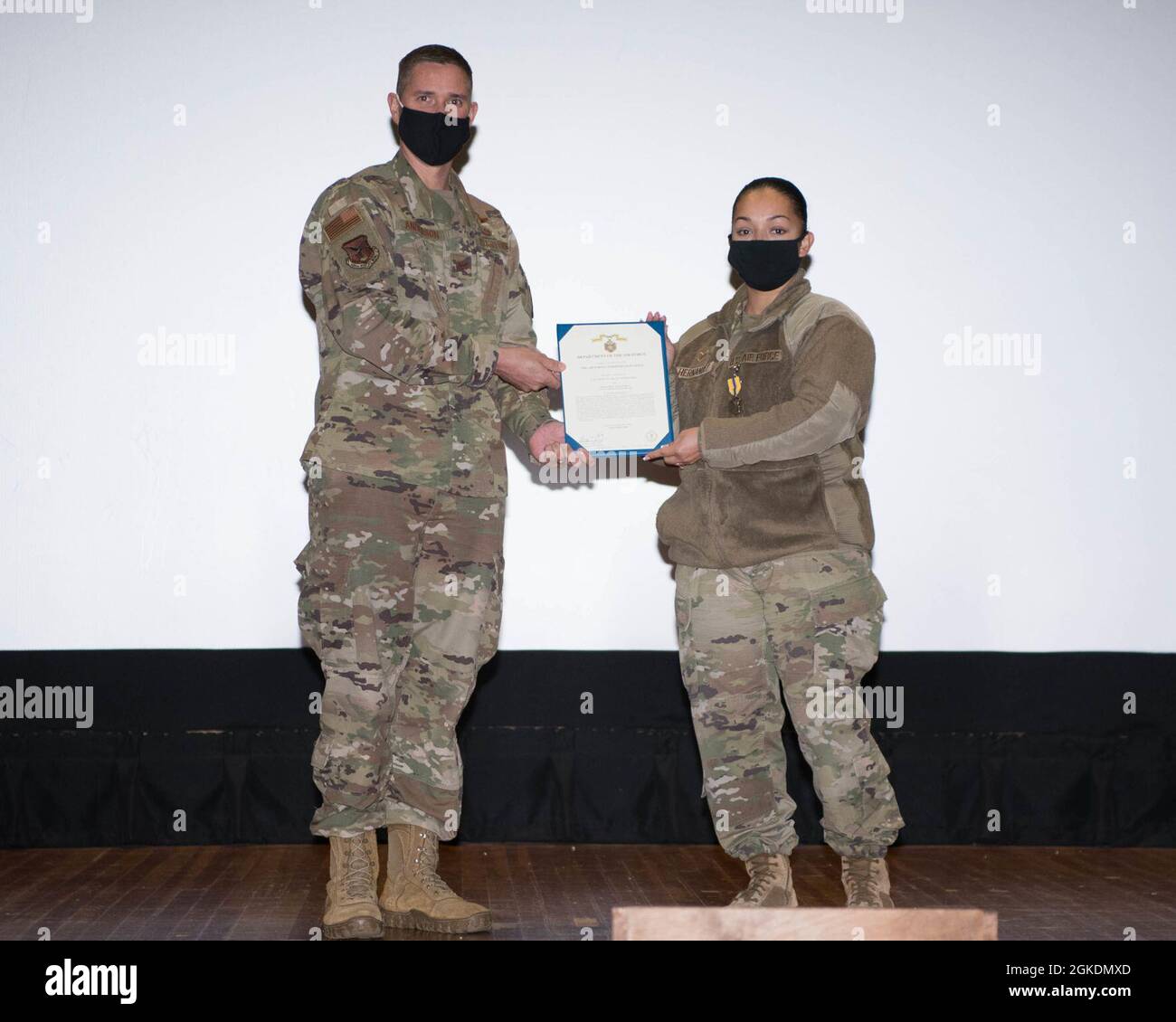 Col. Shanon Anderson, 436th Airlift Wing vice commander, awards Staff ...