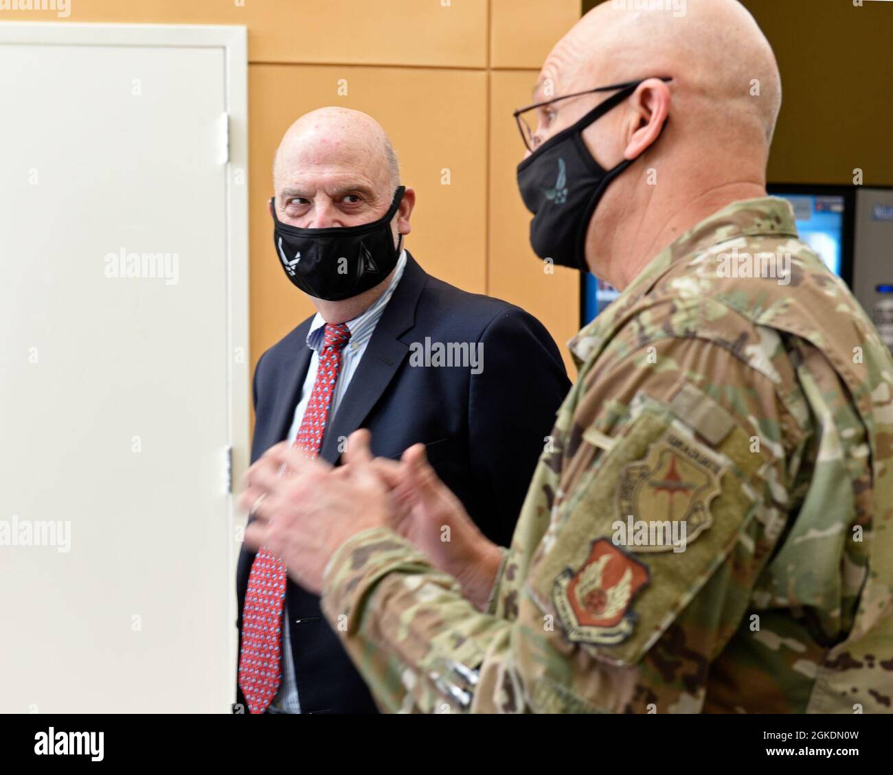 Acting Secretary of the Air Force John Roth, left, is briefed by Gen ...