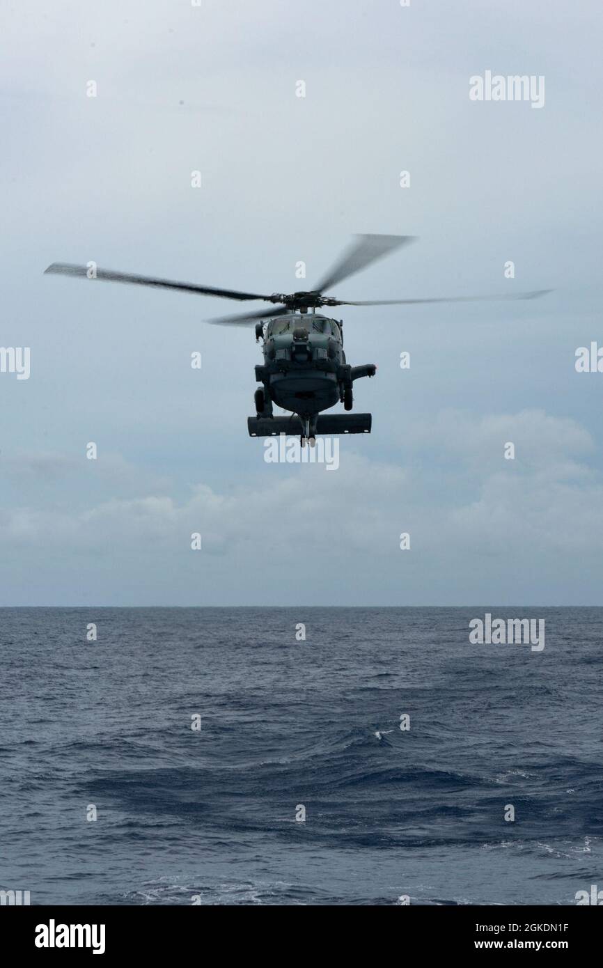 INDIAN OCEAN (March 23, 2021) An MH-60R Sea Hawk, assigned to the “Wolf ...