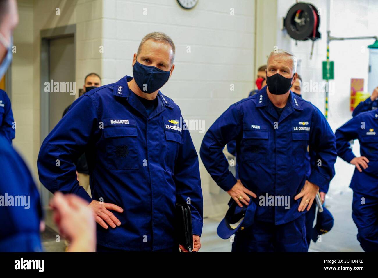 Vice Adm. Michael McAllister, Deputy Commandant for Mission Support, and Vice Adm. Steven Poulin ...