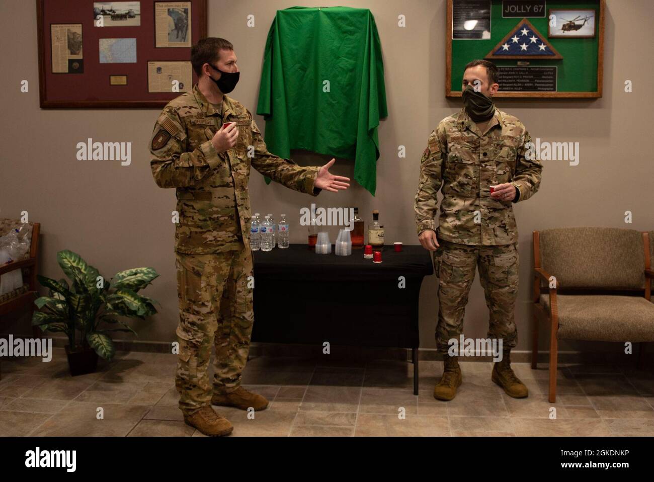 U.S. Air Force Lt. Col. Kevin Geoffroy, left, 41st Rescue Squadron ...