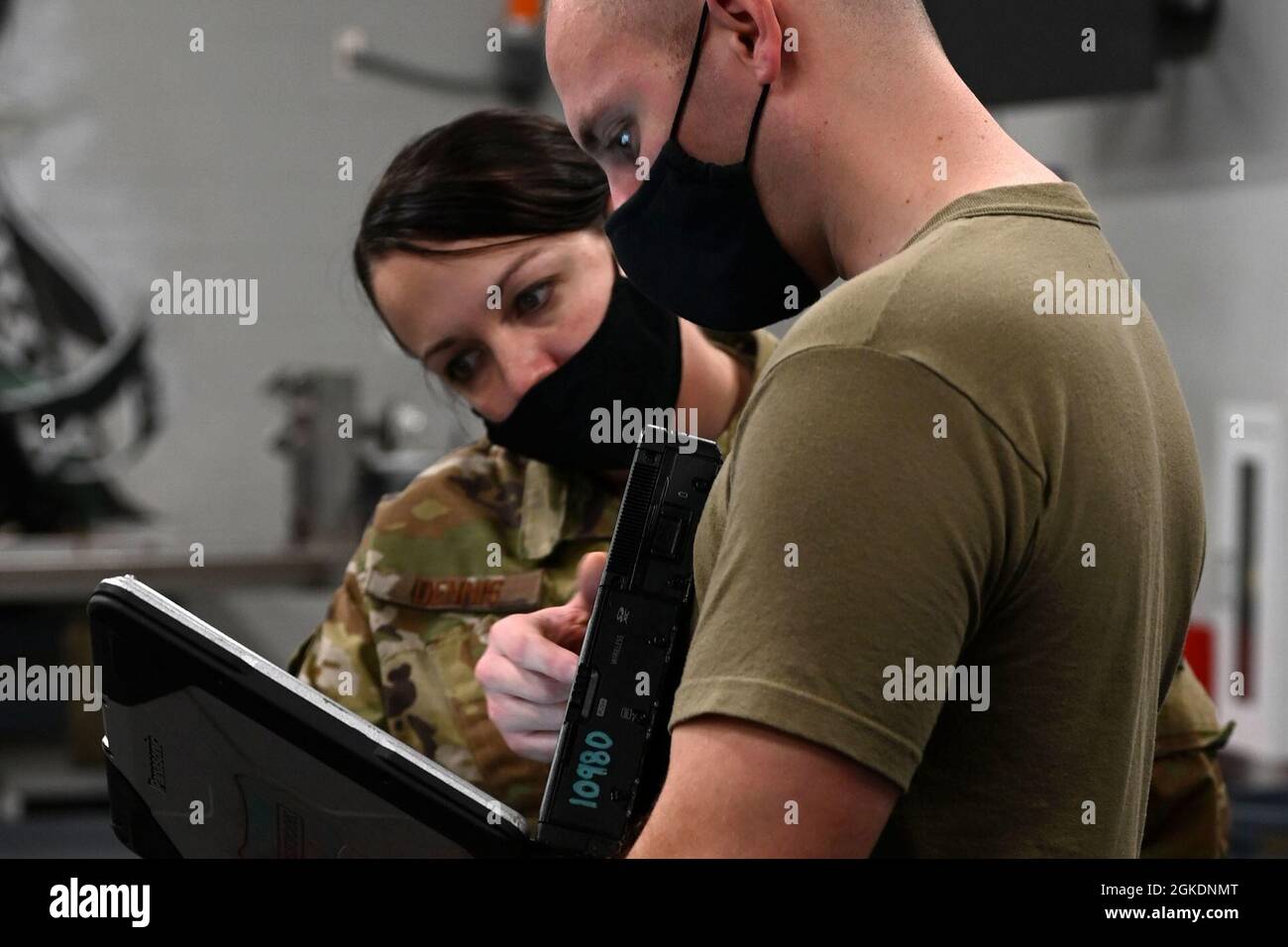 U.S. Air Force Senior Airman Joshua Hall, left, 33rd Maintenance Squadron (MXS) egress systems ...