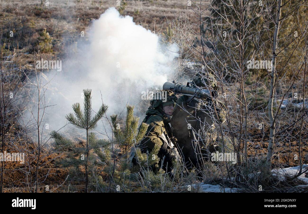 Lithuanian soldiers fire a shoulder mounted rocket launcher simulation ...