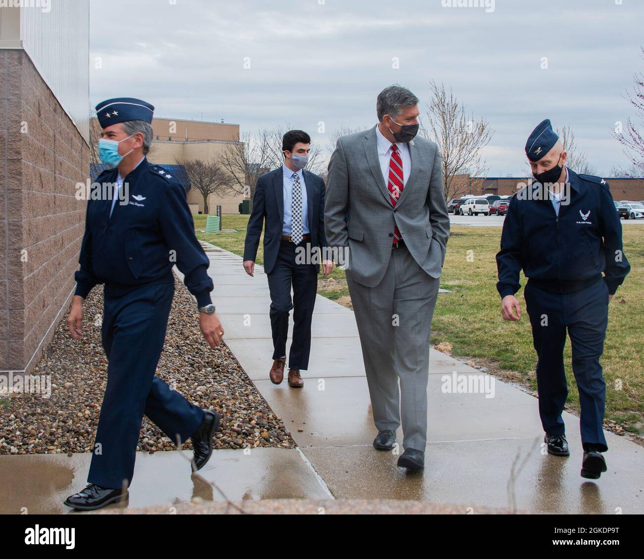 U.S. Representative Darin LaHood (center) is greeted by Maj. Gen. Peter ...