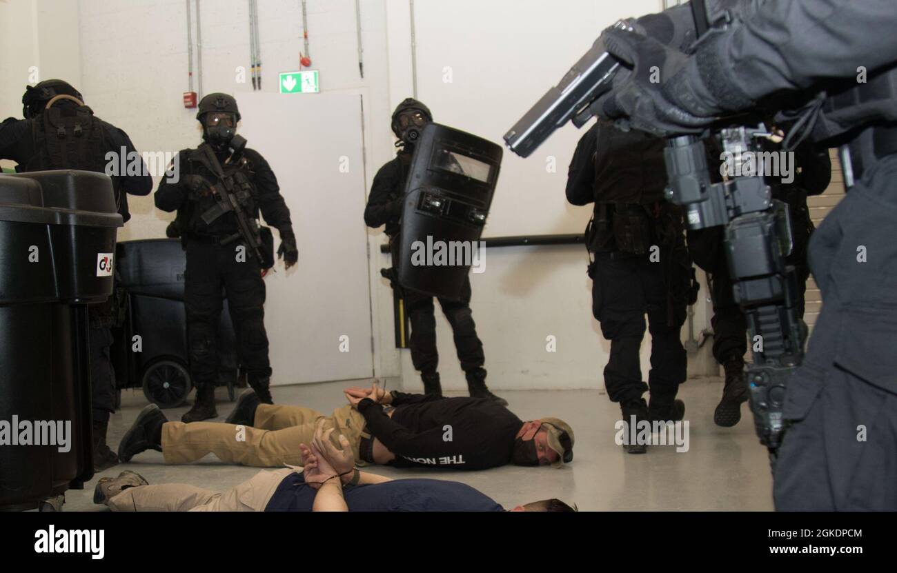 Qatari Special Forces guard detainee role-players in a simulated crisis ...