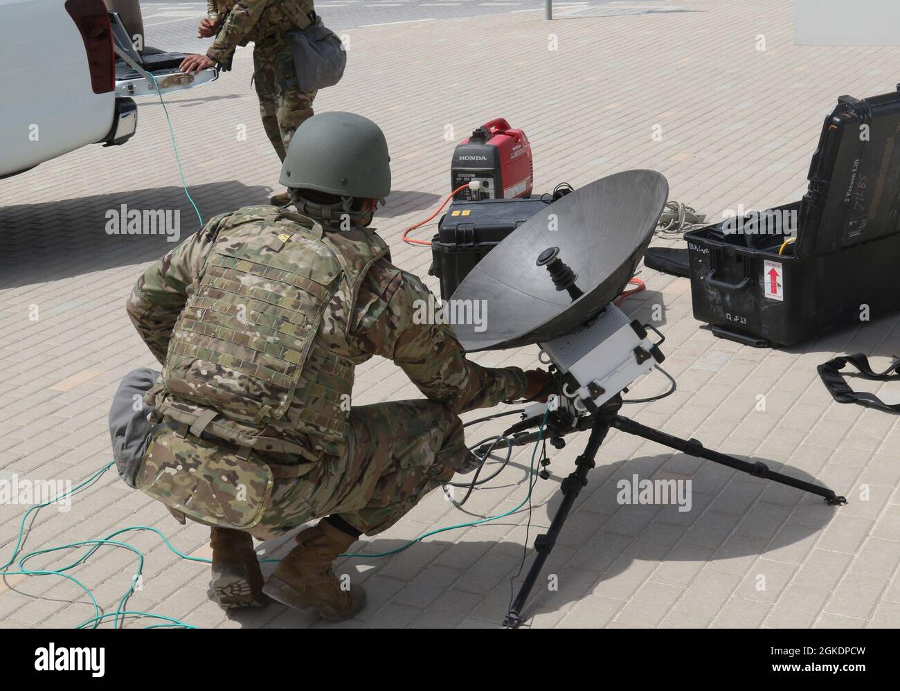 A U.S. Army Soldier establishes satellite communications during U.S ...