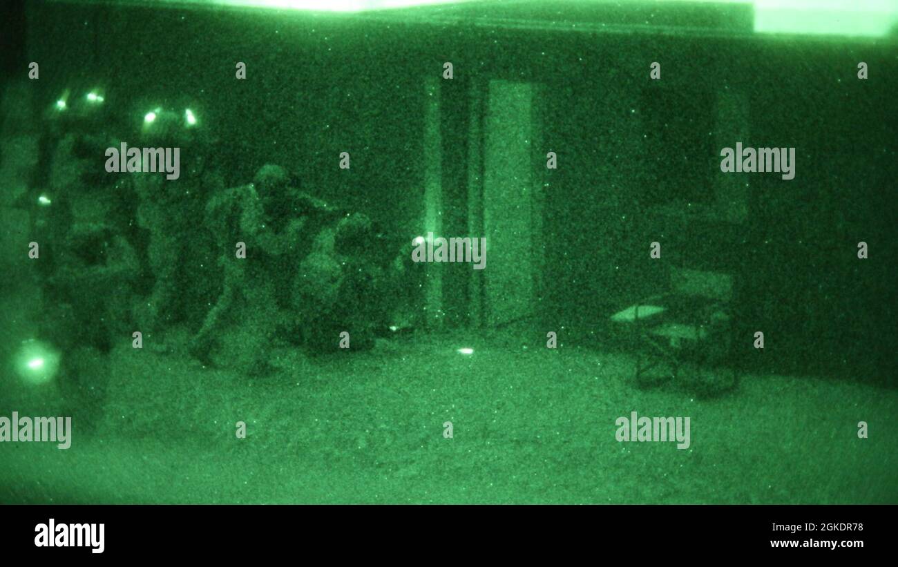 A U.S. Army EOD Technician from 53rd Ordnance Company (EOD) clears a ...
