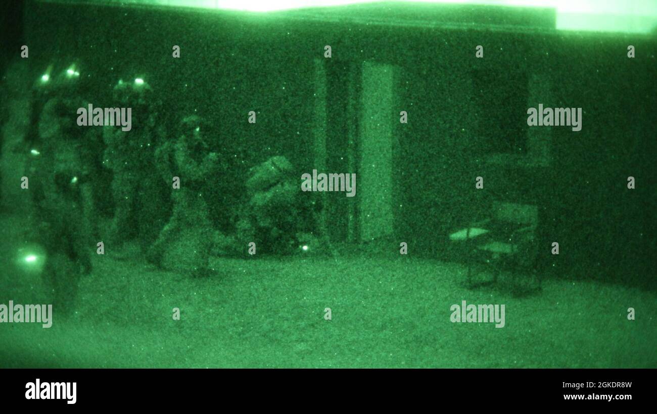 A U.S. Army EOD Technician from 53rd Ordnance Company (EOD) clears a ...