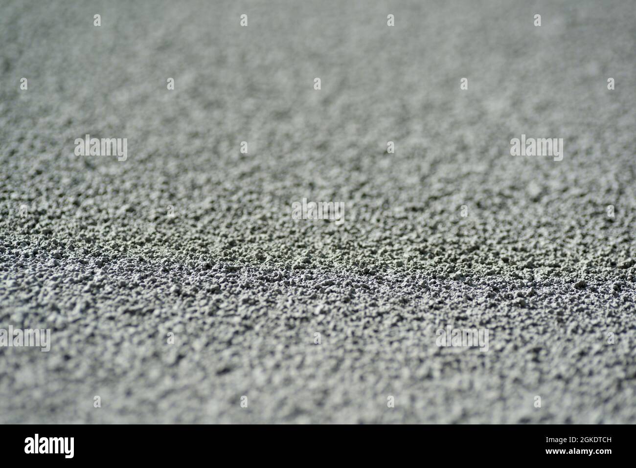Macro texture details of brick wall roughcast painted grey. Shallow ...