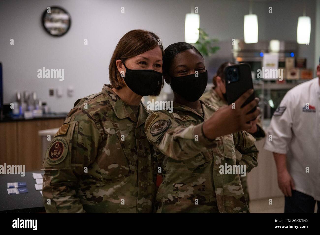 Chief Master Sgt. of the Air Force JoAnne Bass, left, takes a photo ...