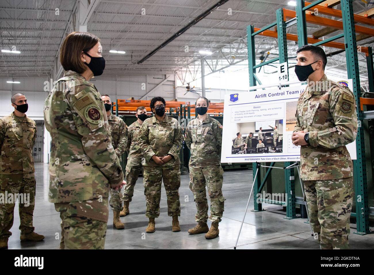 U.S. Air Force Staff Sgt. Hector Montoya, right, briefs Chief Master ...