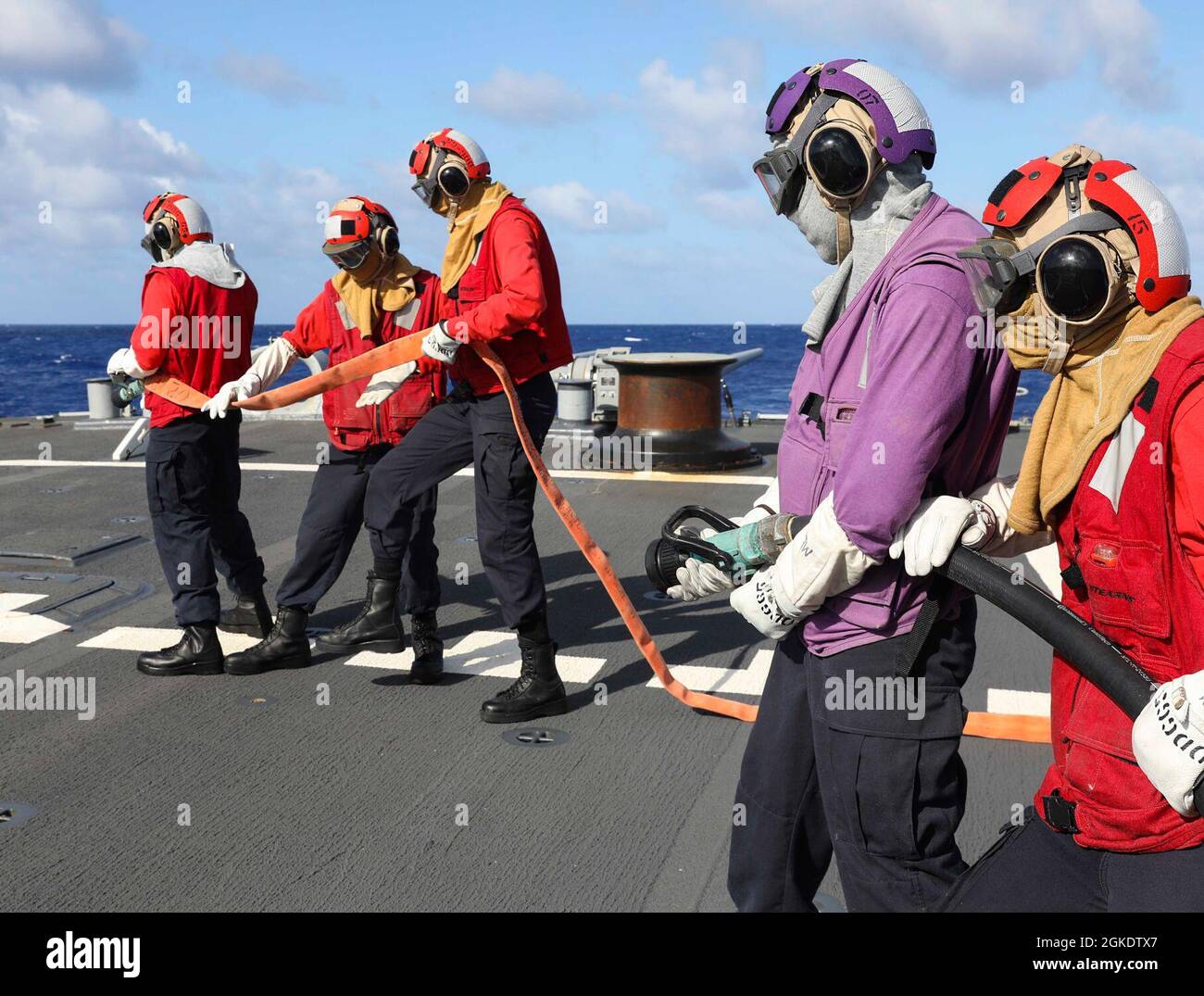Sailors aboard the Arleigh Burke-class guided-missile destroyer USS ...