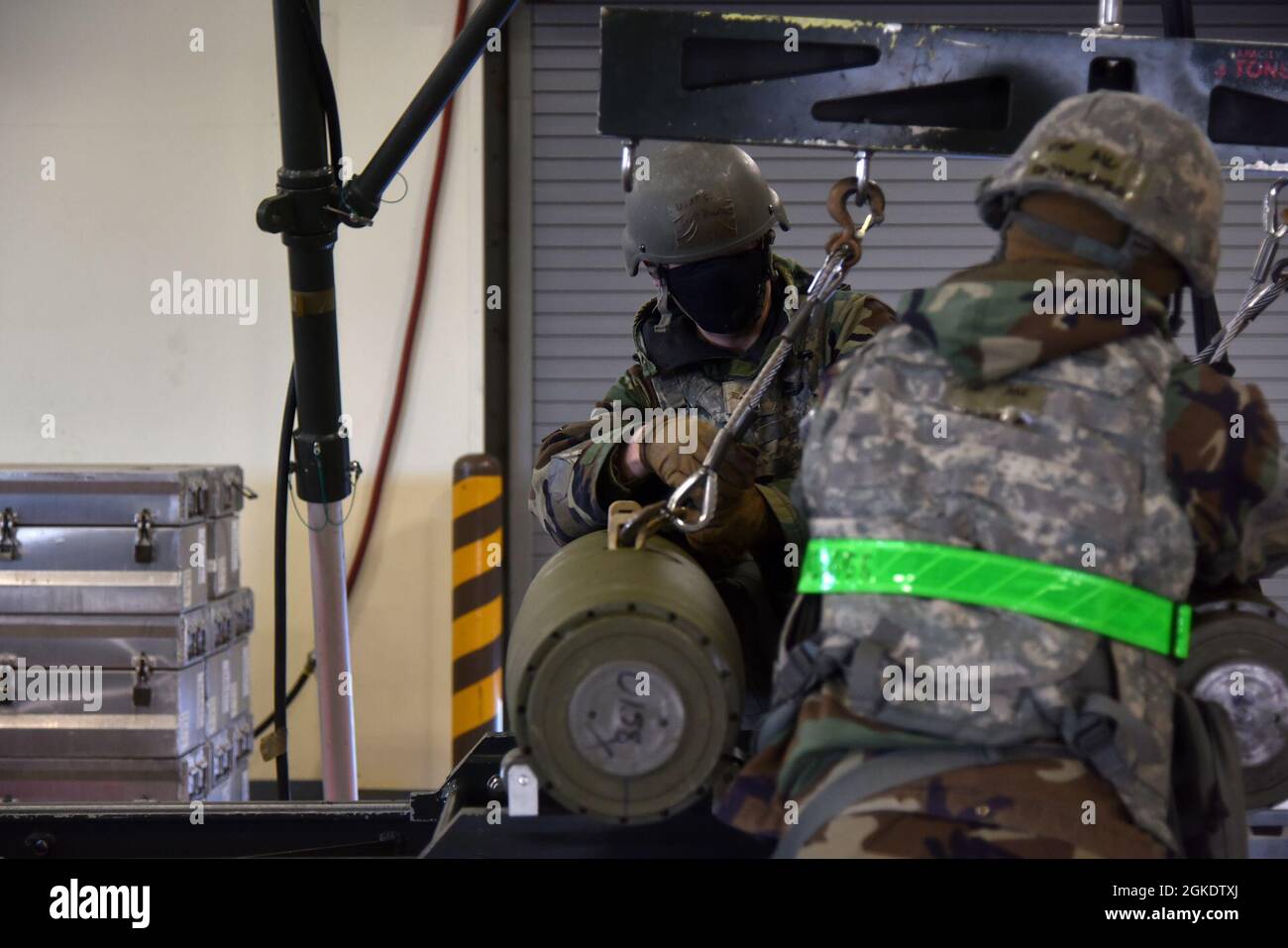 Eighth Maintenance Squadron conventional maintenance crew members load ...