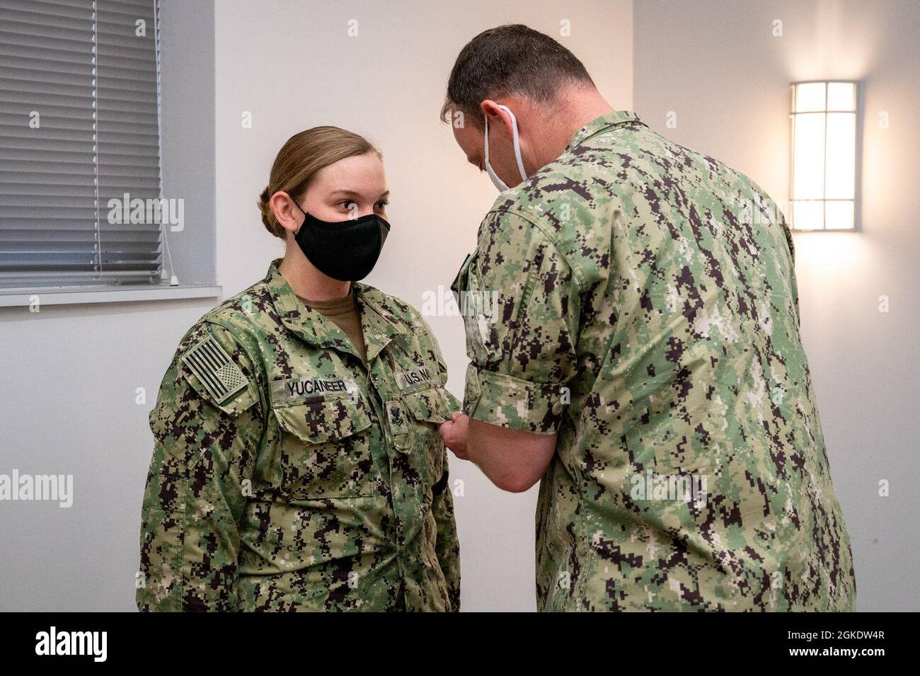 WASHINGTON, DC (March 24, 2021) – Capt. Grahame Dicks (right), Naval ...