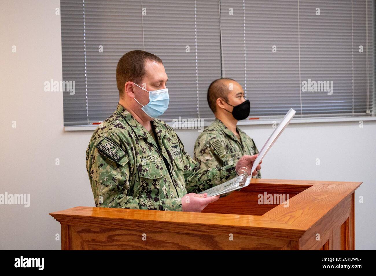 WASHINGTON, DC (March 24, 2021) – Cmdr. Anthony Militello (left), Naval ...