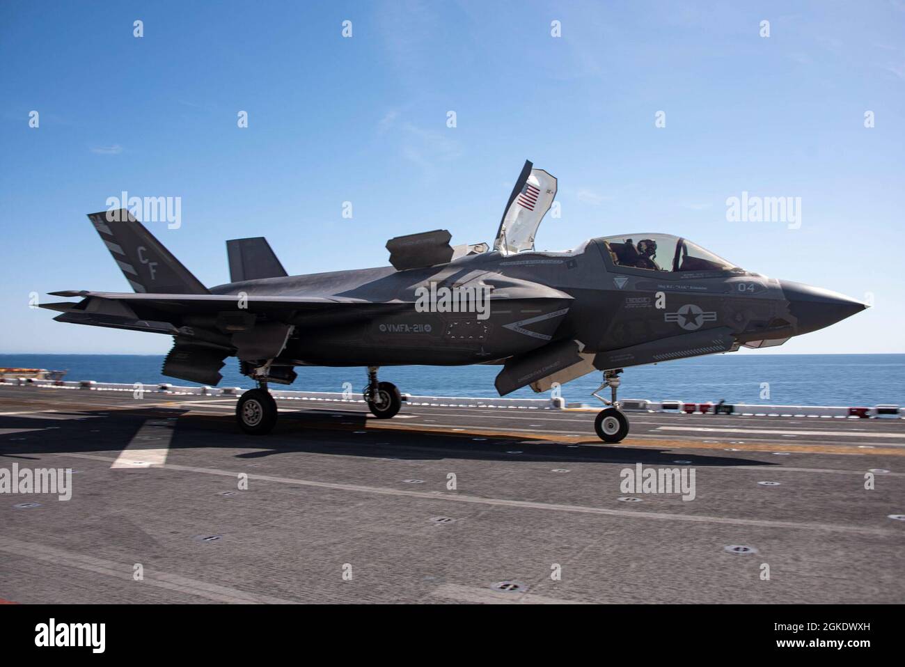 PACIFIC OCEAN (March 24, 2021) An F-35B Lightning II, attached to ...