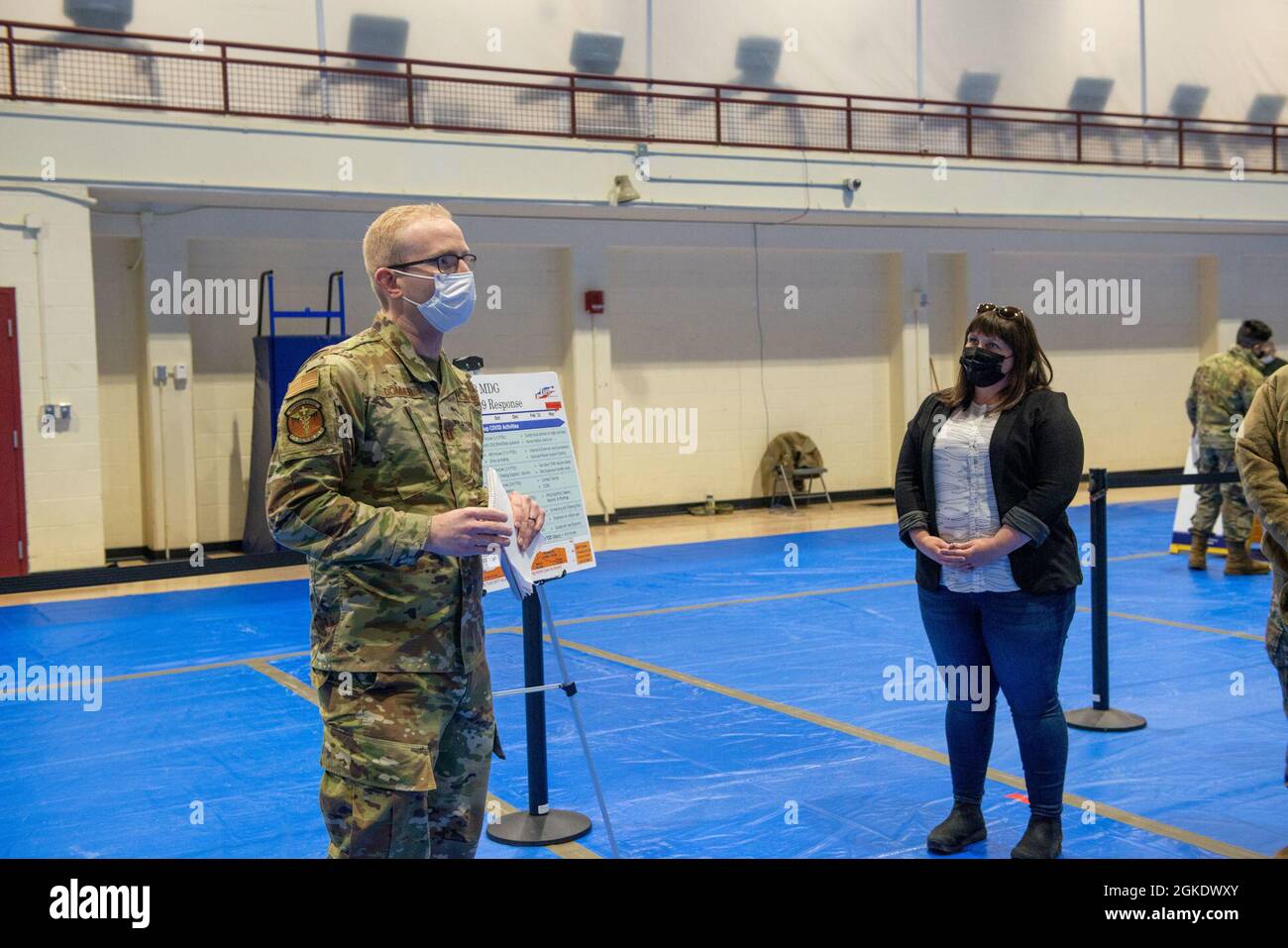 U.S. Air Force Capt. Jason Dommer, left, chief of the medical control ...