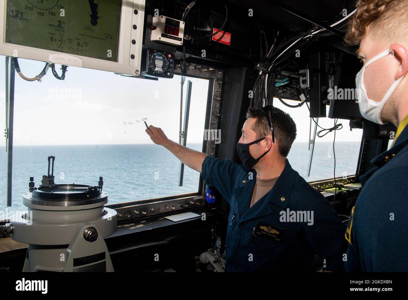 PACIFIC OCEAN (March 24, 2021) — Lt. Cmdr. Christopher Jackson, a Navy ...