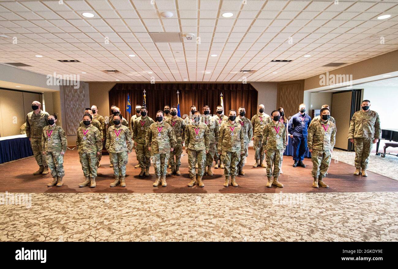 U.S. Air Force Col. Patrick Miller, 88th Air Base Wing commander, left ...