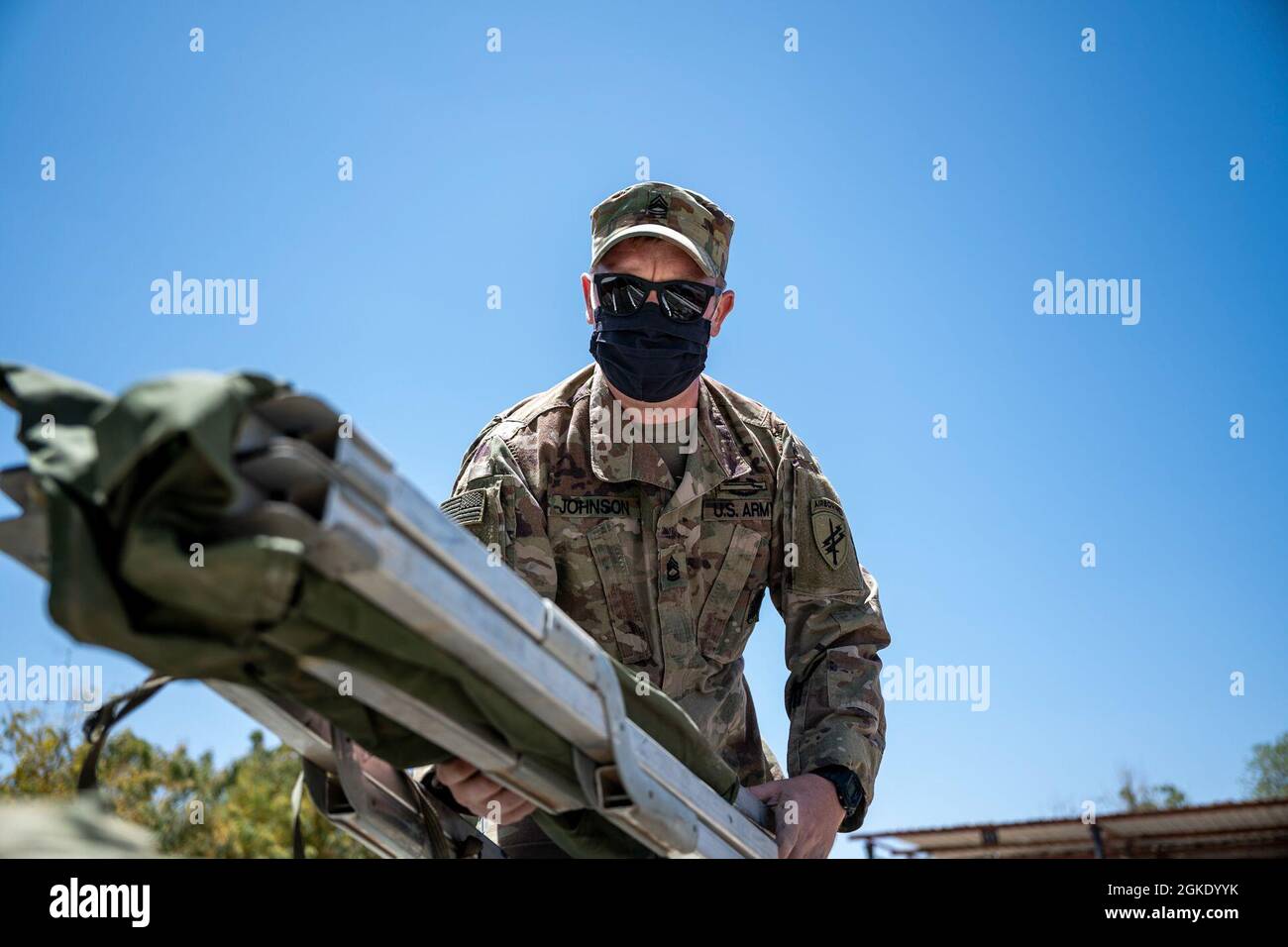 U.S. Army Sgt. 1st Class Brett Johnson, team sergeant, 443rd Civil ...