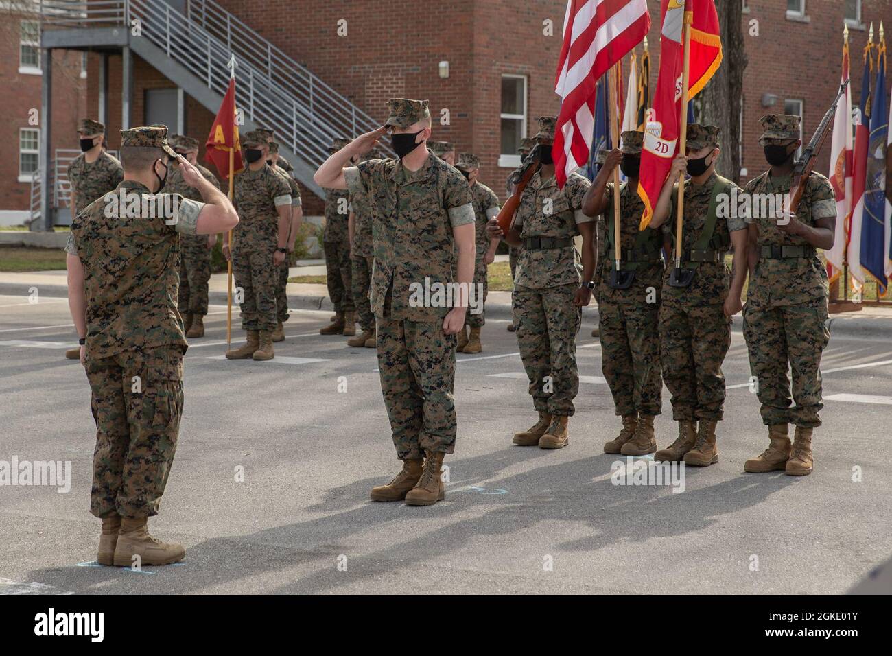 U.S. Marine Corps Capt. Ryan Himmighoefer, center, the company ...