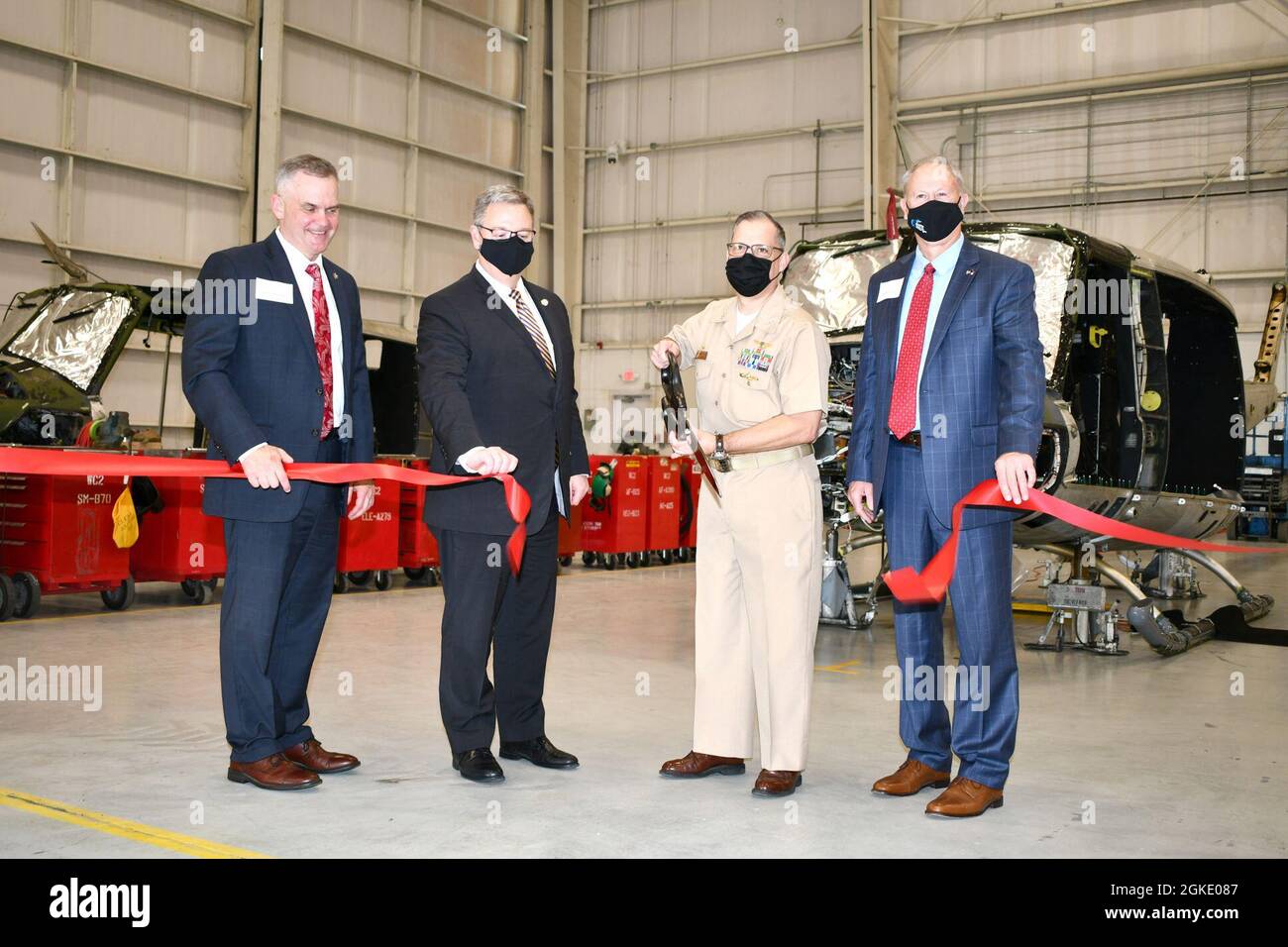 Fleet Readiness Center East Commanding Officer Capt. Mark E. Nieto cuts ...