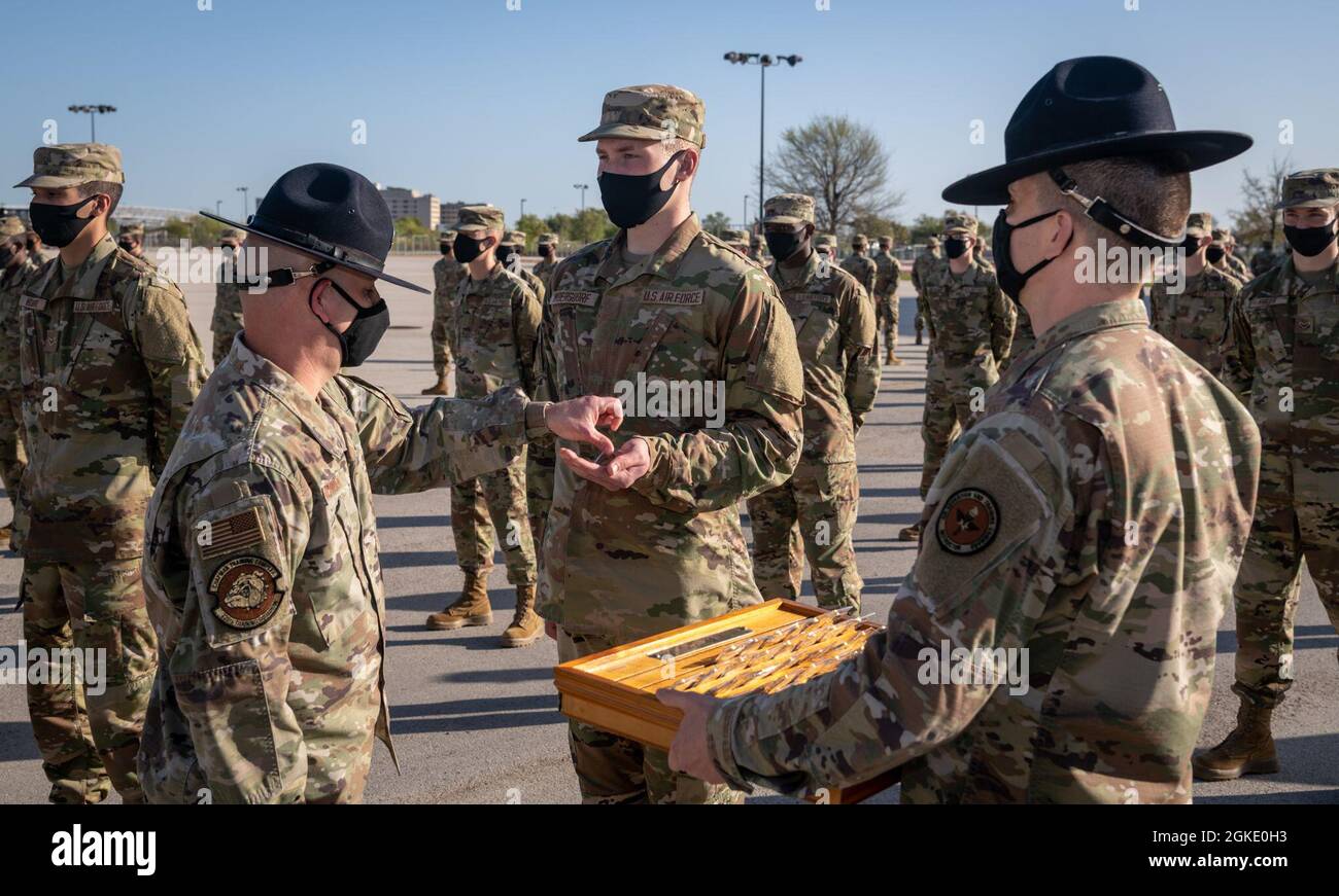 U.S. Air Force basic military graduation and coining ceremony is held ...