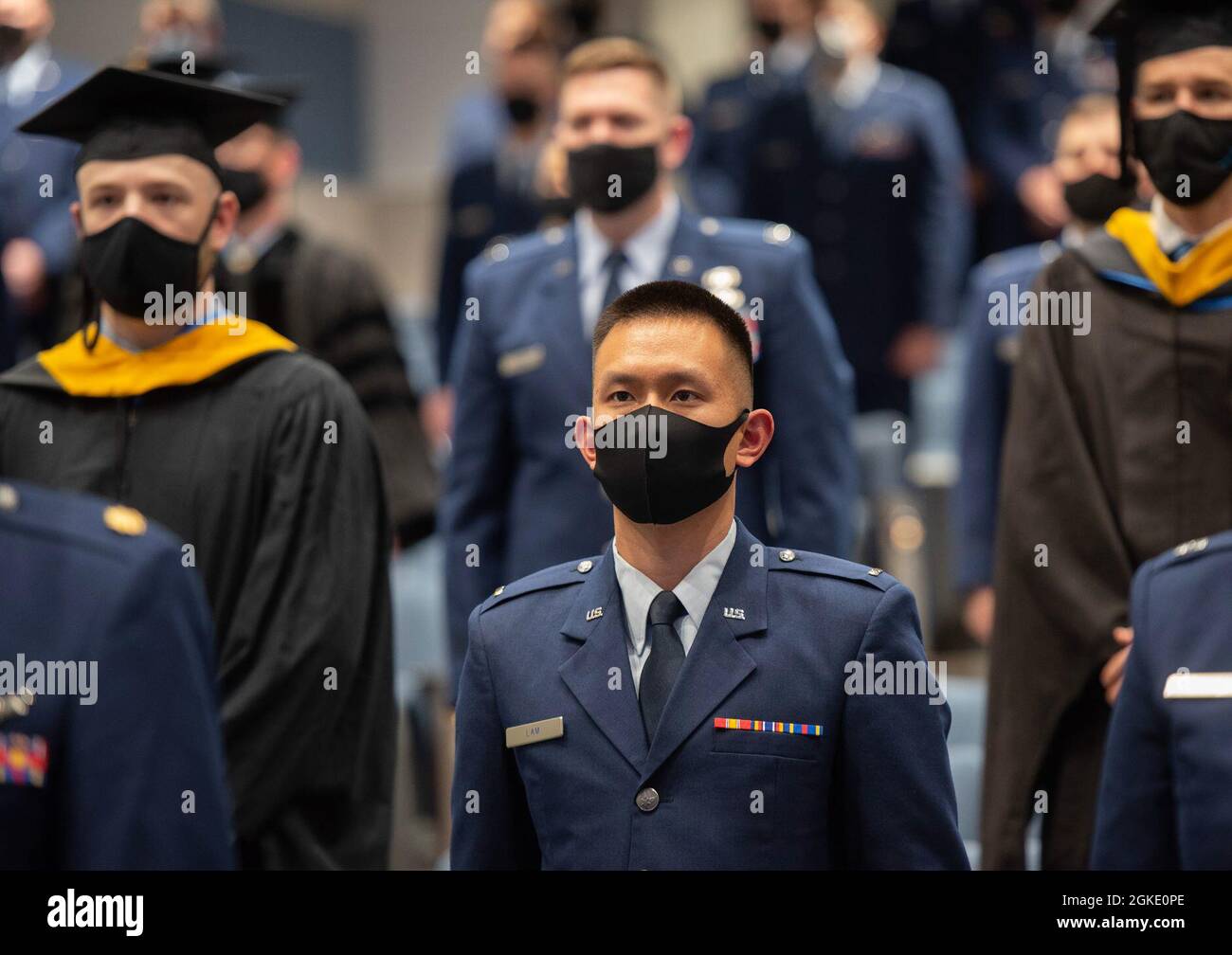 U.S. Air Force 2nd Lt. Benjamin Lam and his classmates take their seats ...