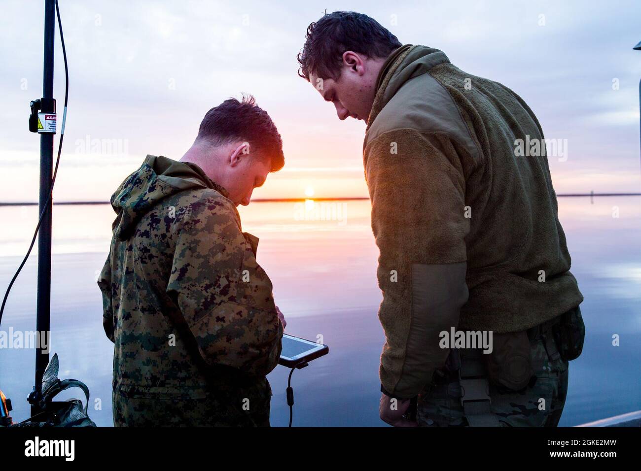 U.S. Marine Corps Sgt. Jeramiah Meade, Left, a section chief with 2nd ...