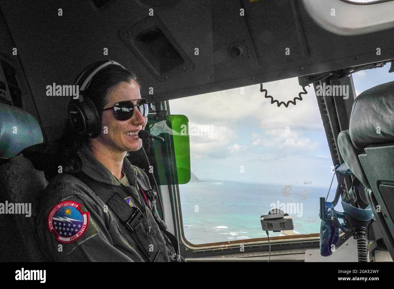 Maj. Cari Piha, 535th Airlift Squadron instructor pilot, conducts an ...