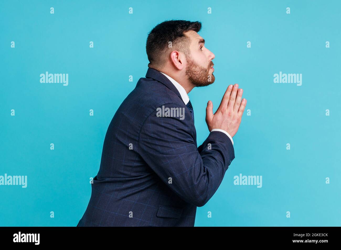 Praying man profile hi-res stock photography and images - Alamy
