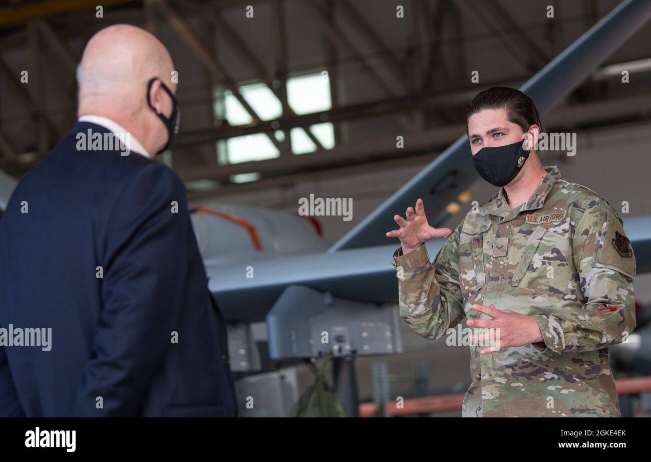 Acting Secretary of the Air Force John Roth, speaks with Airmen from ...
