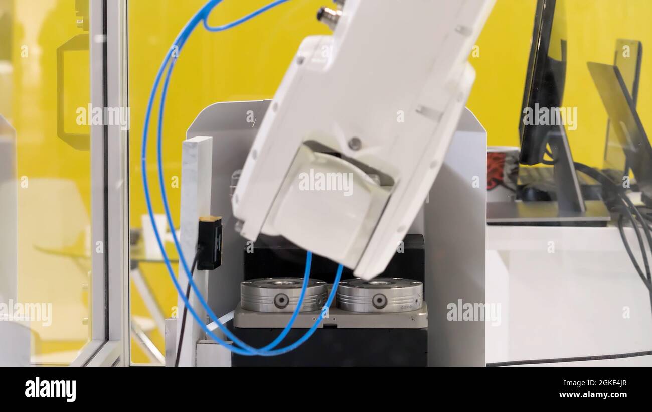 Commercial production concept, robotic automated equipment in action ...