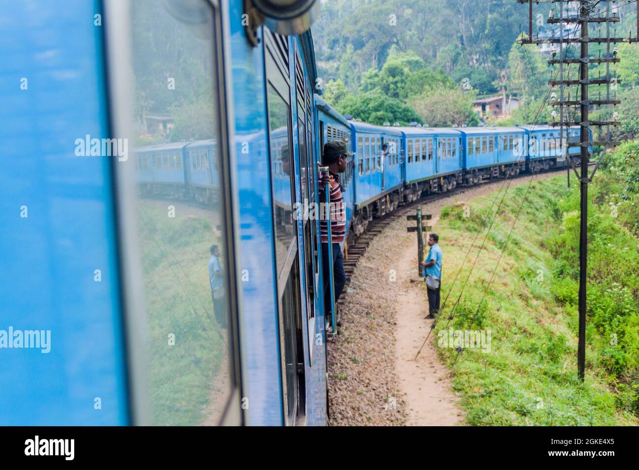 BANDARAWELA, SRI LANKA - JULY 15, 2016: Train rides through mountains ...
