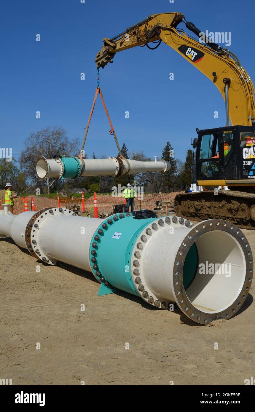 Components for the pump at the lift station are being installed as part ...