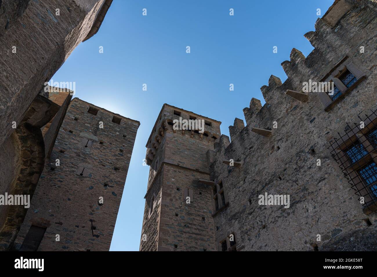 The castle of Fénis, located in the municipality of the same name, is ...