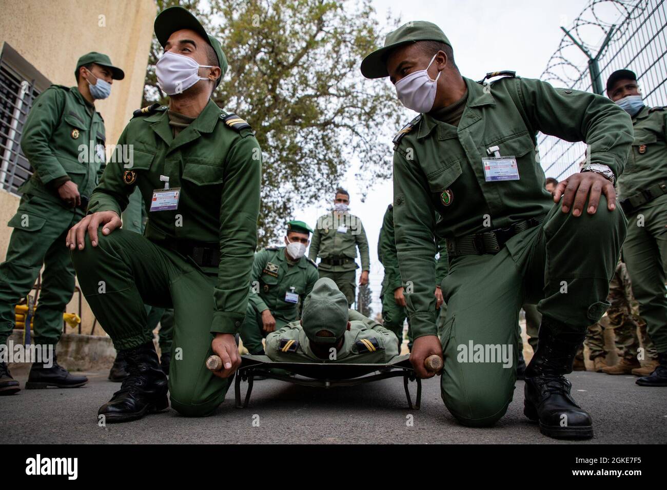 Members of the Royal Moroccan Armed Forces prepare to pick up a ...