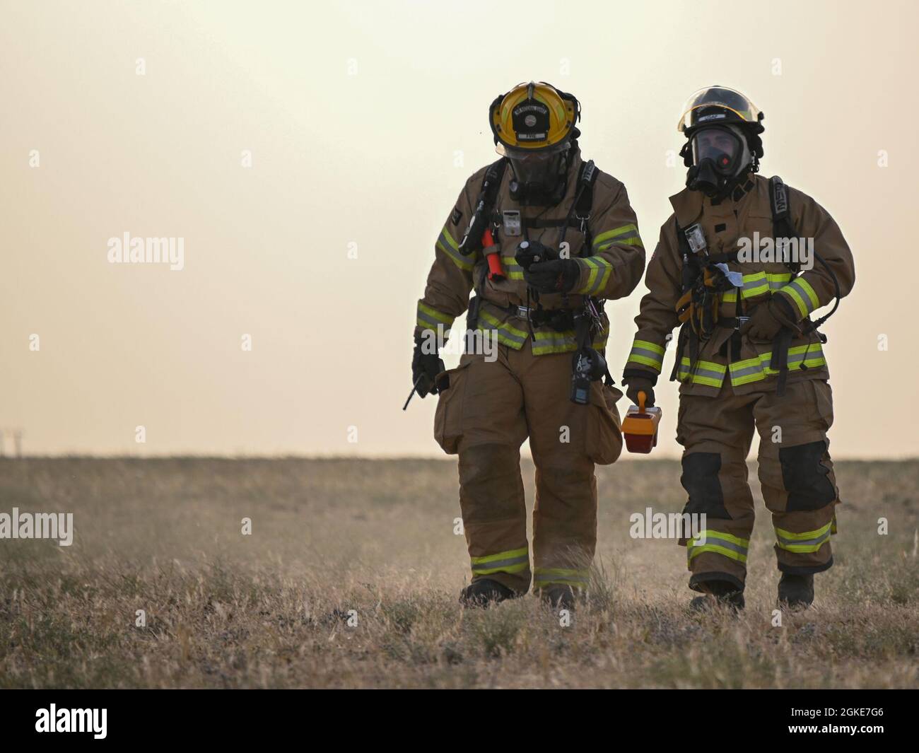 Two U.S. Air Force firemen assigned to the 386th Air Expeditionary Wing ...