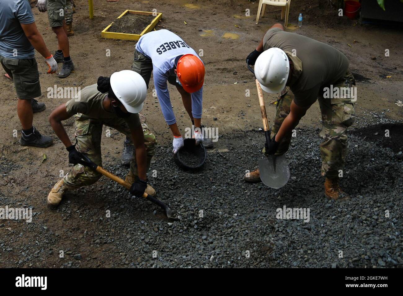 U.S. Army Pfc. Diamond Cousins (left), 561st Engineering Construction ...