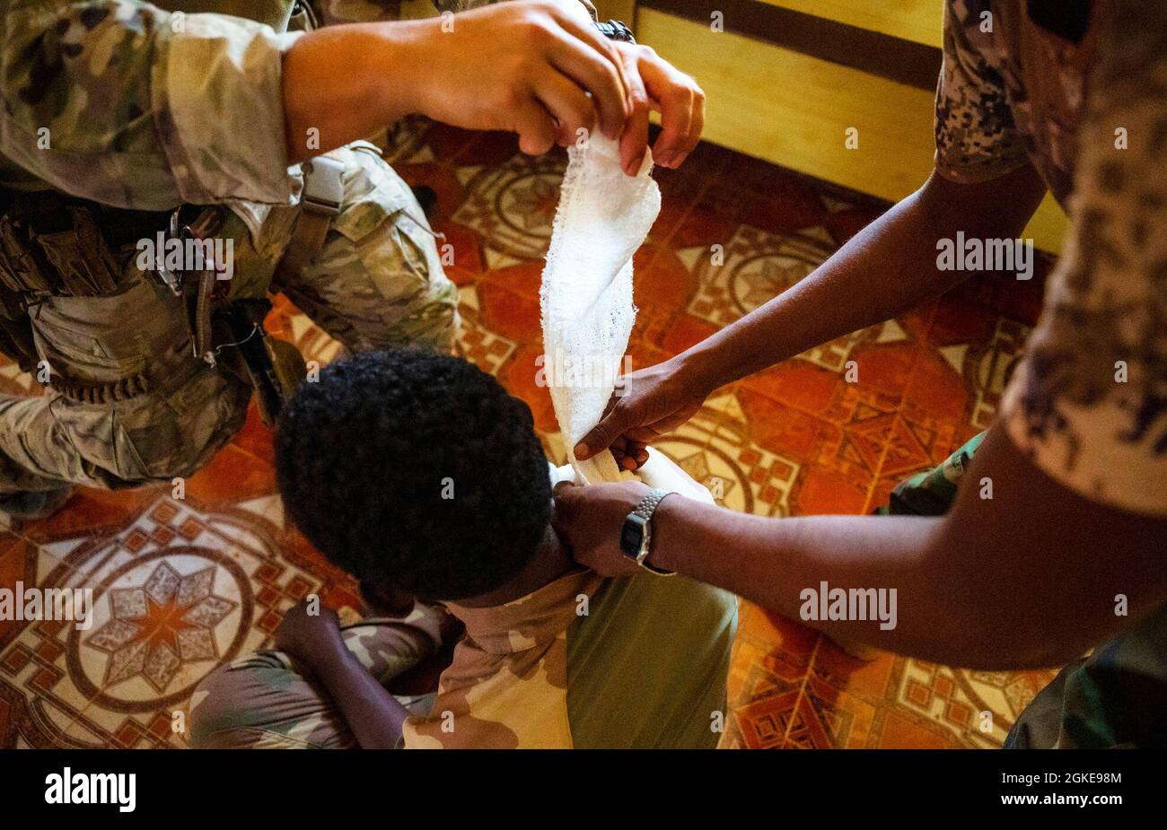 U.S. forces conduct Tactical Combat Casualty Care (TCCC) training for ...