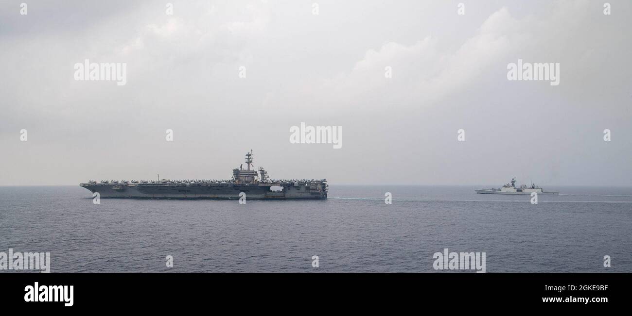 INDIAN OCEAN (March 28, 2021) The aircraft carrier USS Theodore Roosevelt (CVN 71) transits in ...
